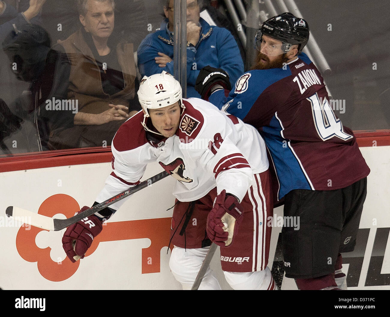 Denver, Colorado, USA. 11th February 2013. Coyotes RW DAVID MOSS, left ...