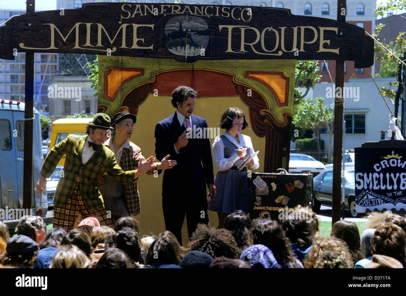 members of the San Francisco Mime troupe , a guerrilla theater, perform ...