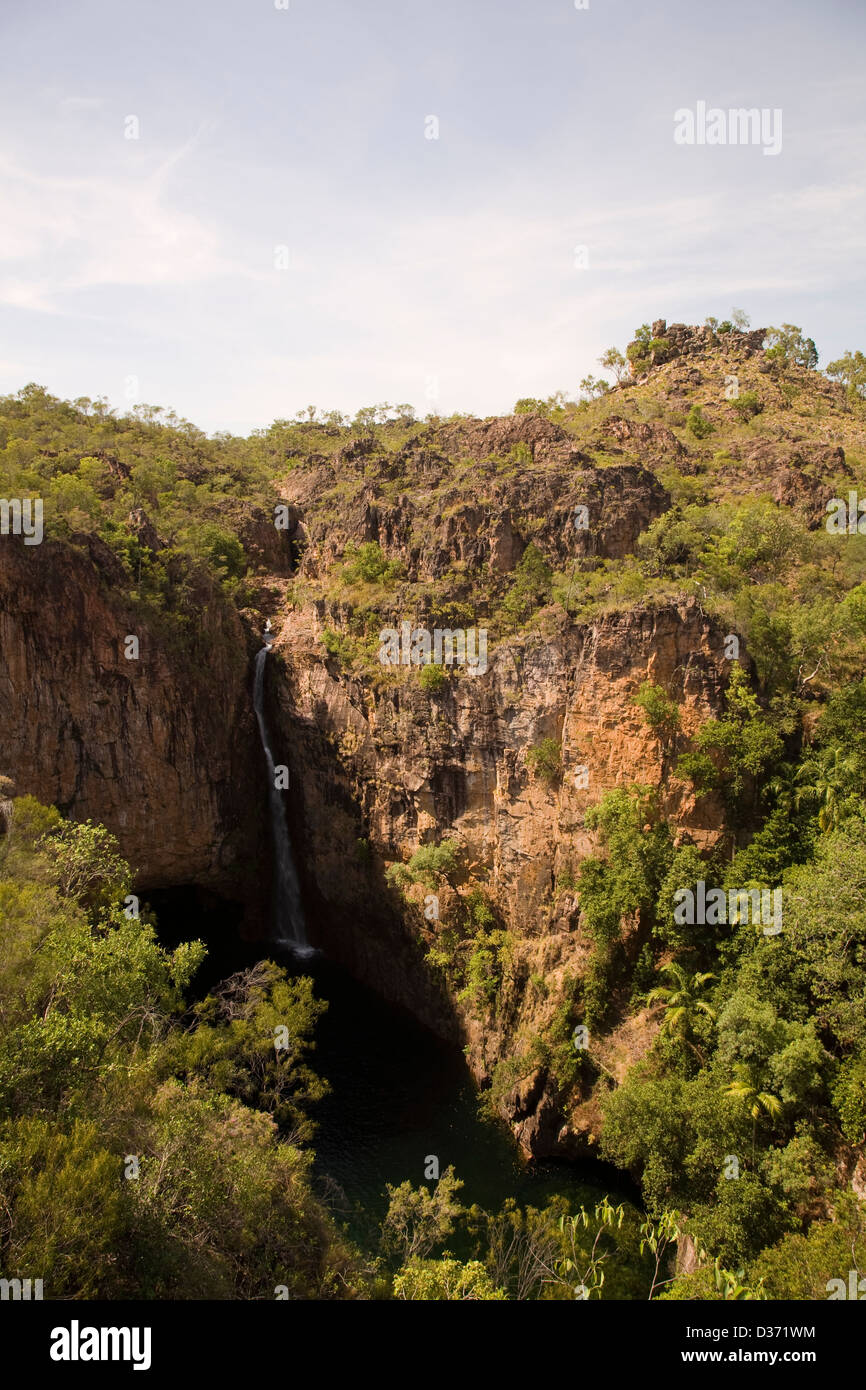 Tolmer Falls cascades over a high sandstone escarpment into a deep pool ...