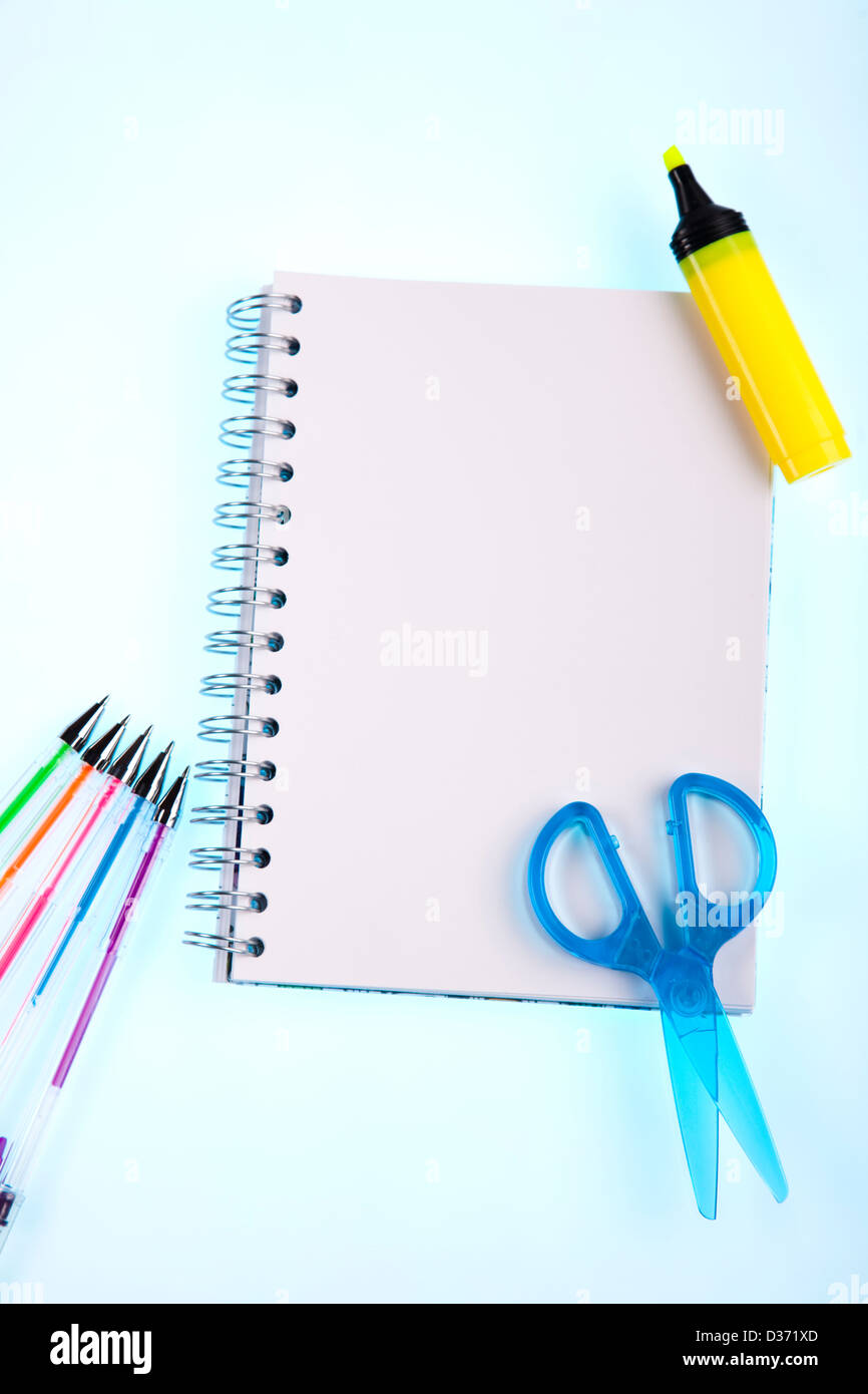 Back to school, Notepad with supplies and scissors Stock Photo - Alamy