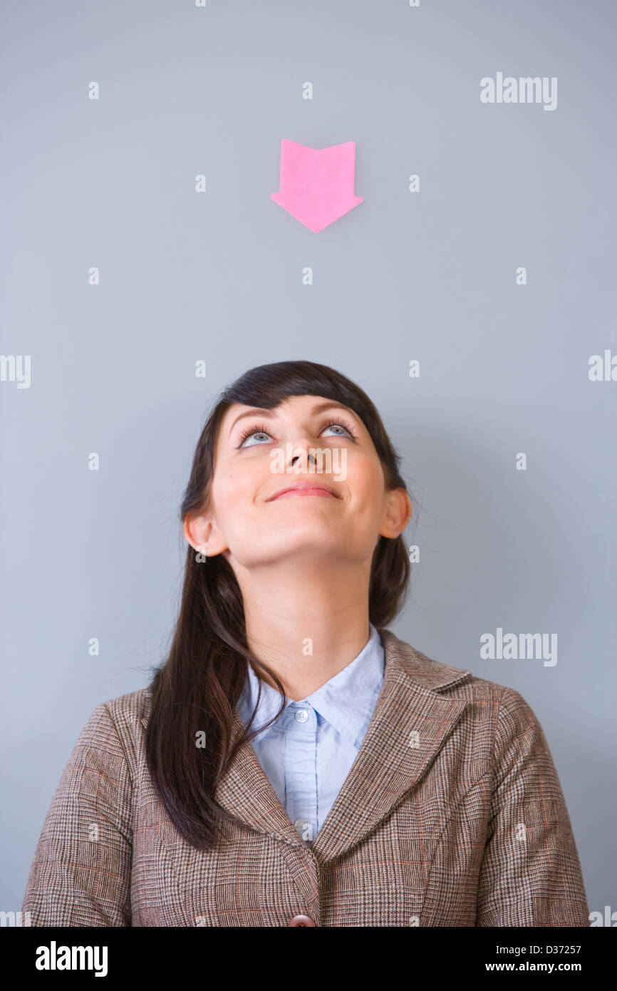 Business Woman thinking with idea bubble Stock Photo - Alamy