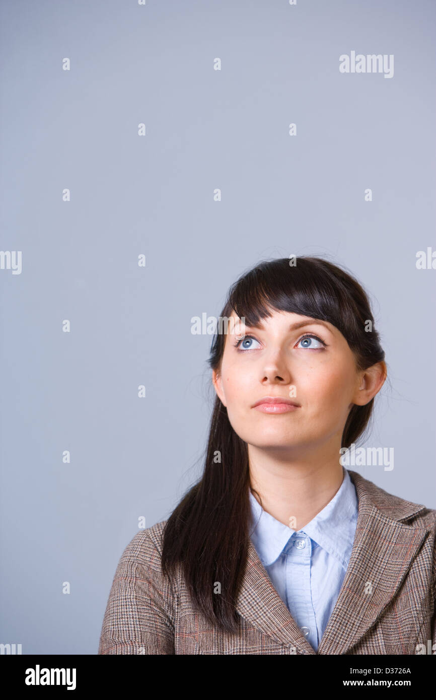 Business Woman Thinking in a Modern Office Stock Photo - Alamy