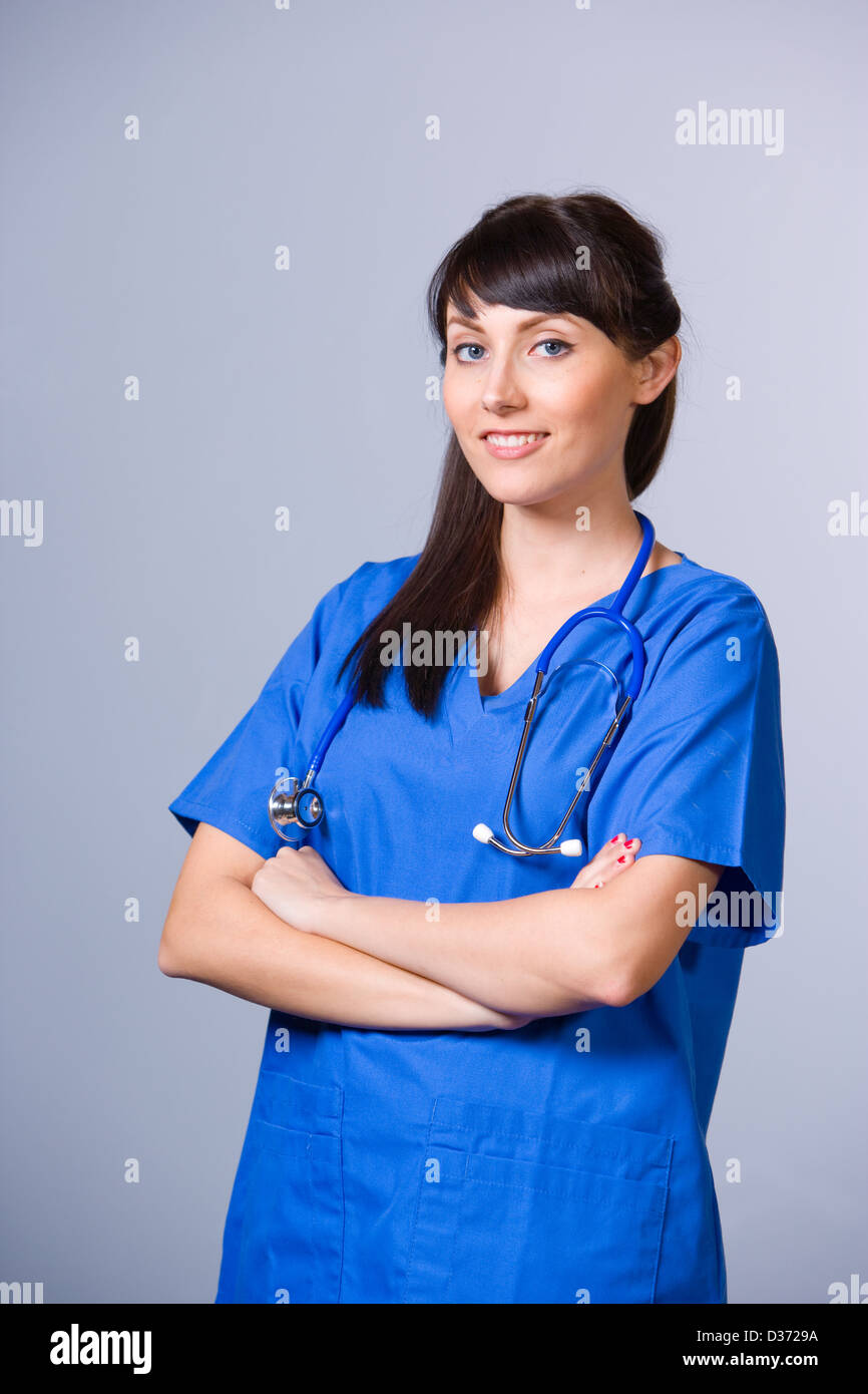 Nurse arms crossed in modern hospital Stock Photo - Alamy