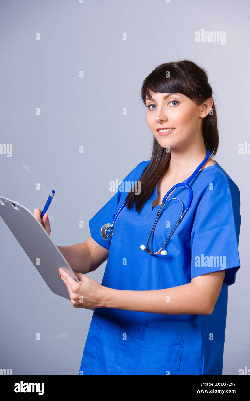 Woman Nurse with chart in modern hospital Stock Photo - Alamy