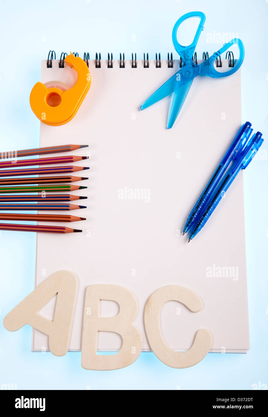 Notebook, Alphabet and school supplies Stock Photo - Alamy