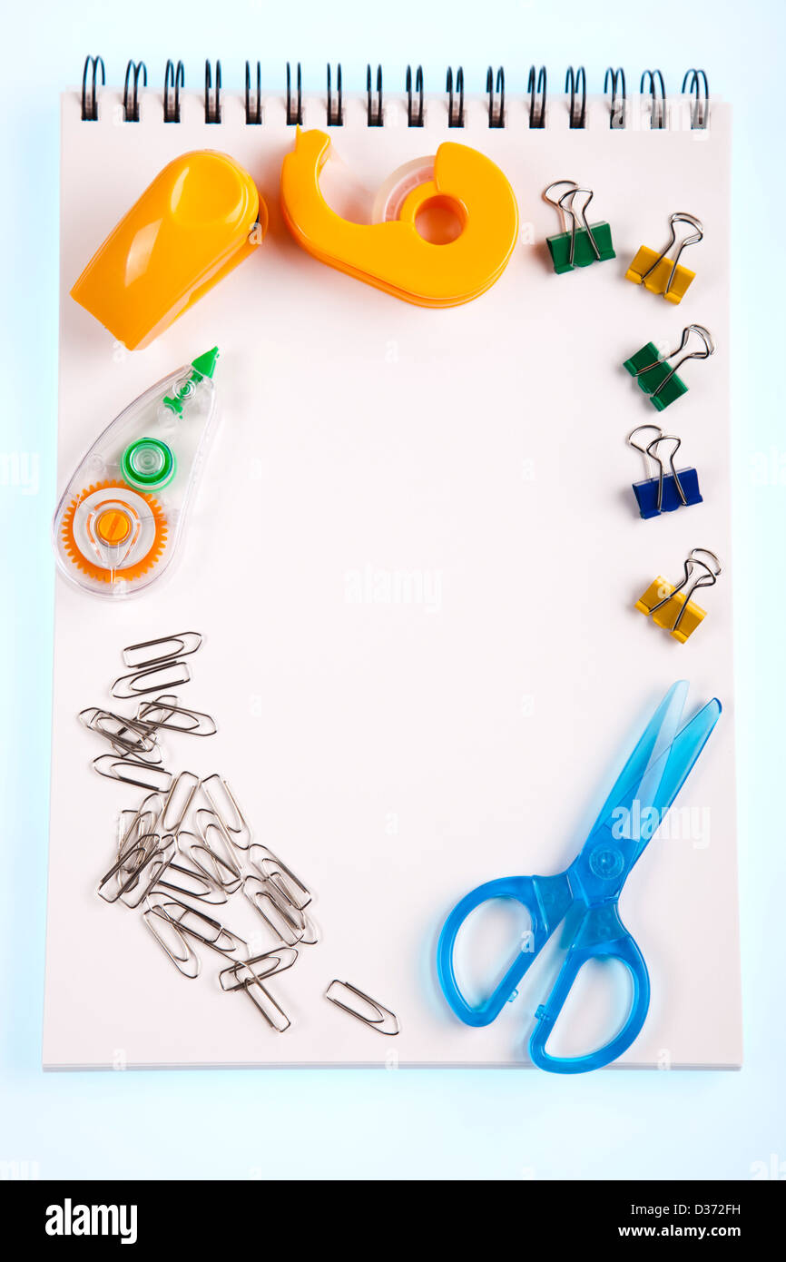 Notepad with school supplies and scissors Stock Photo - Alamy