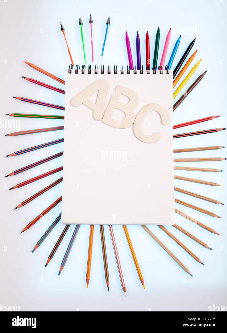 Notebook, Alphabet and school supplies Stock Photo - Alamy