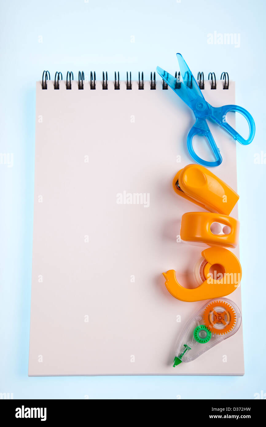 Notepad with school supplies and scissors Stock Photo - Alamy