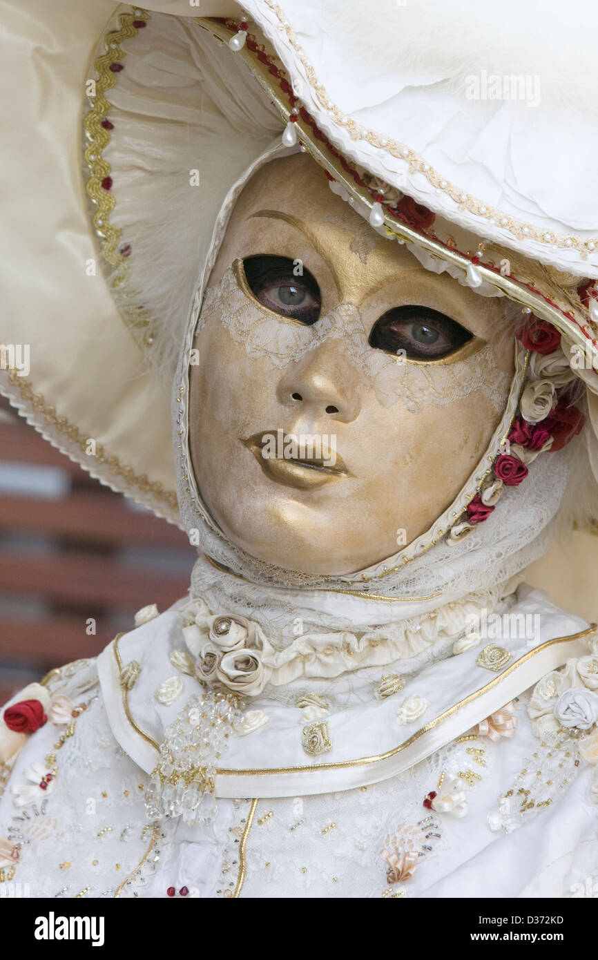 Traditional Venetian masks being worn at the carnival of Venice in San ...