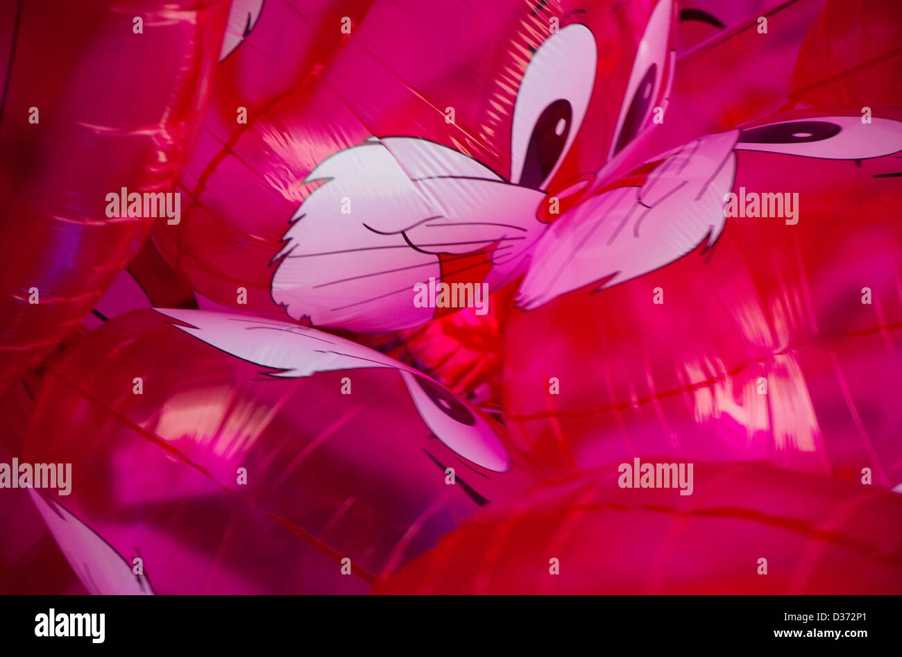 Bunch of pink rabbit shaped balloons Stock Photo - Alamy