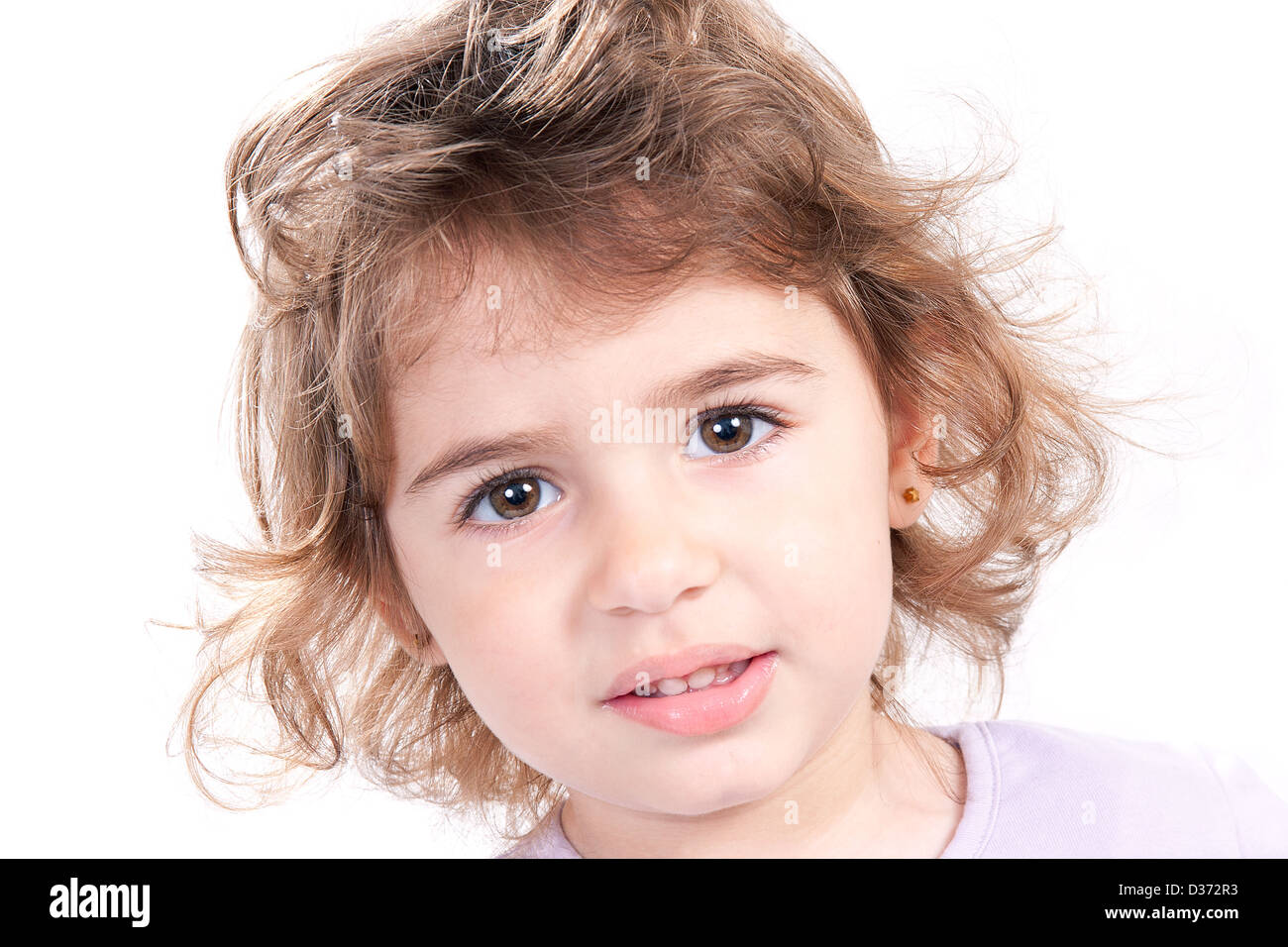 Little girl on a white background Stock Photo - Alamy