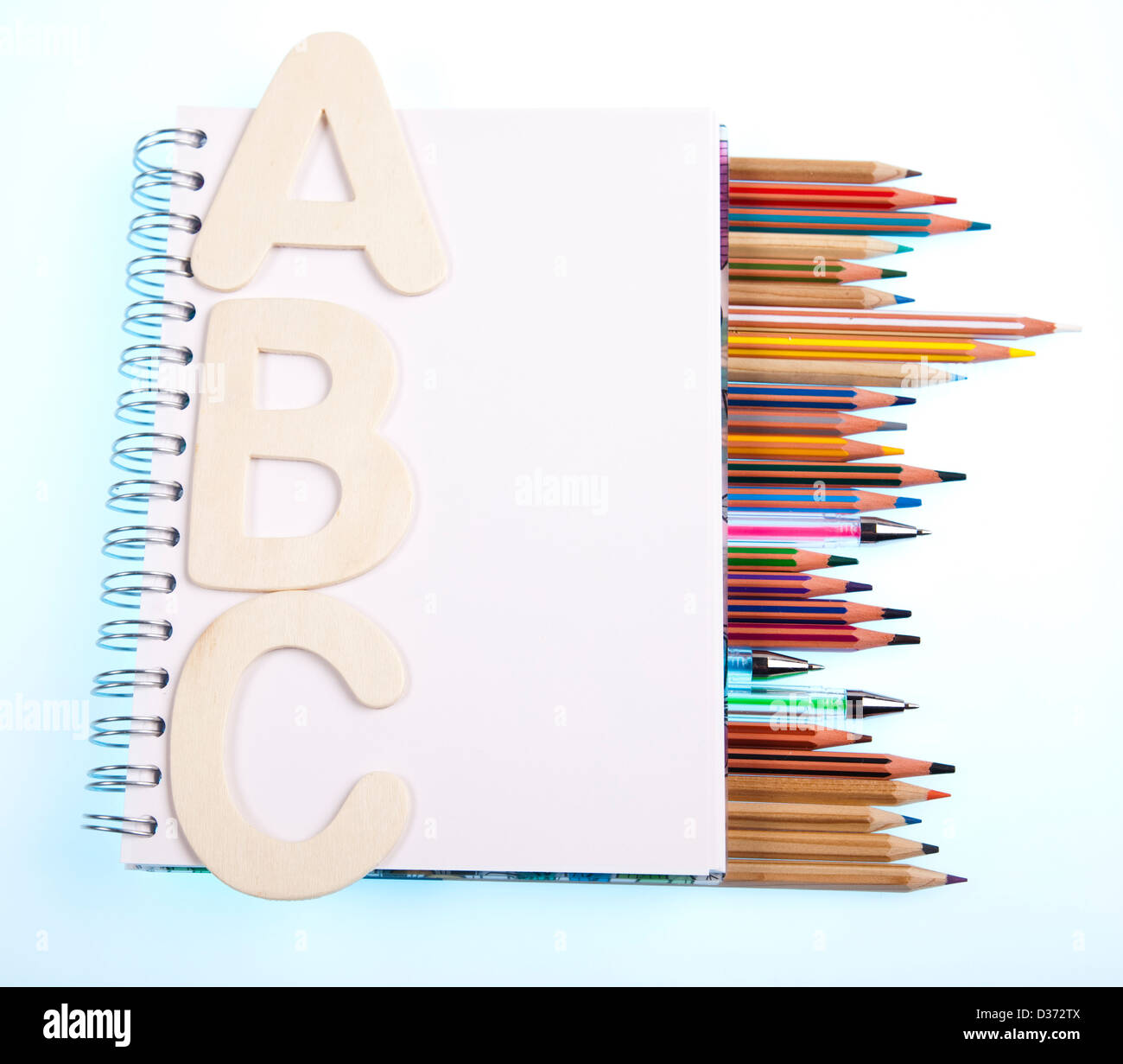 Notebook, Alphabet and school supplies Stock Photo - Alamy