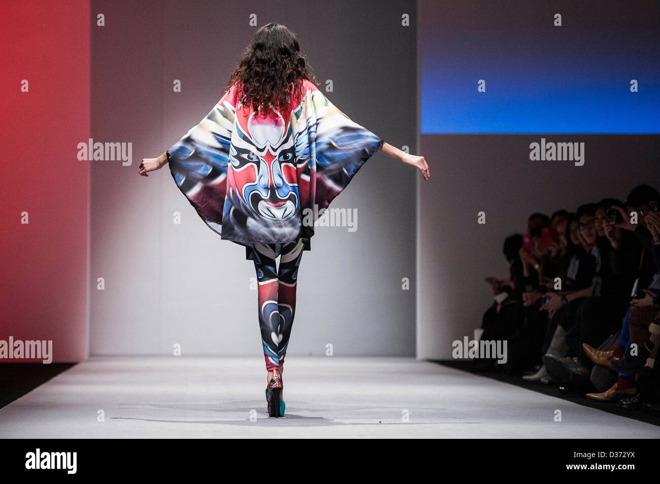 A model showcases designs on the runway by Eric Cheung during day 3 of ...