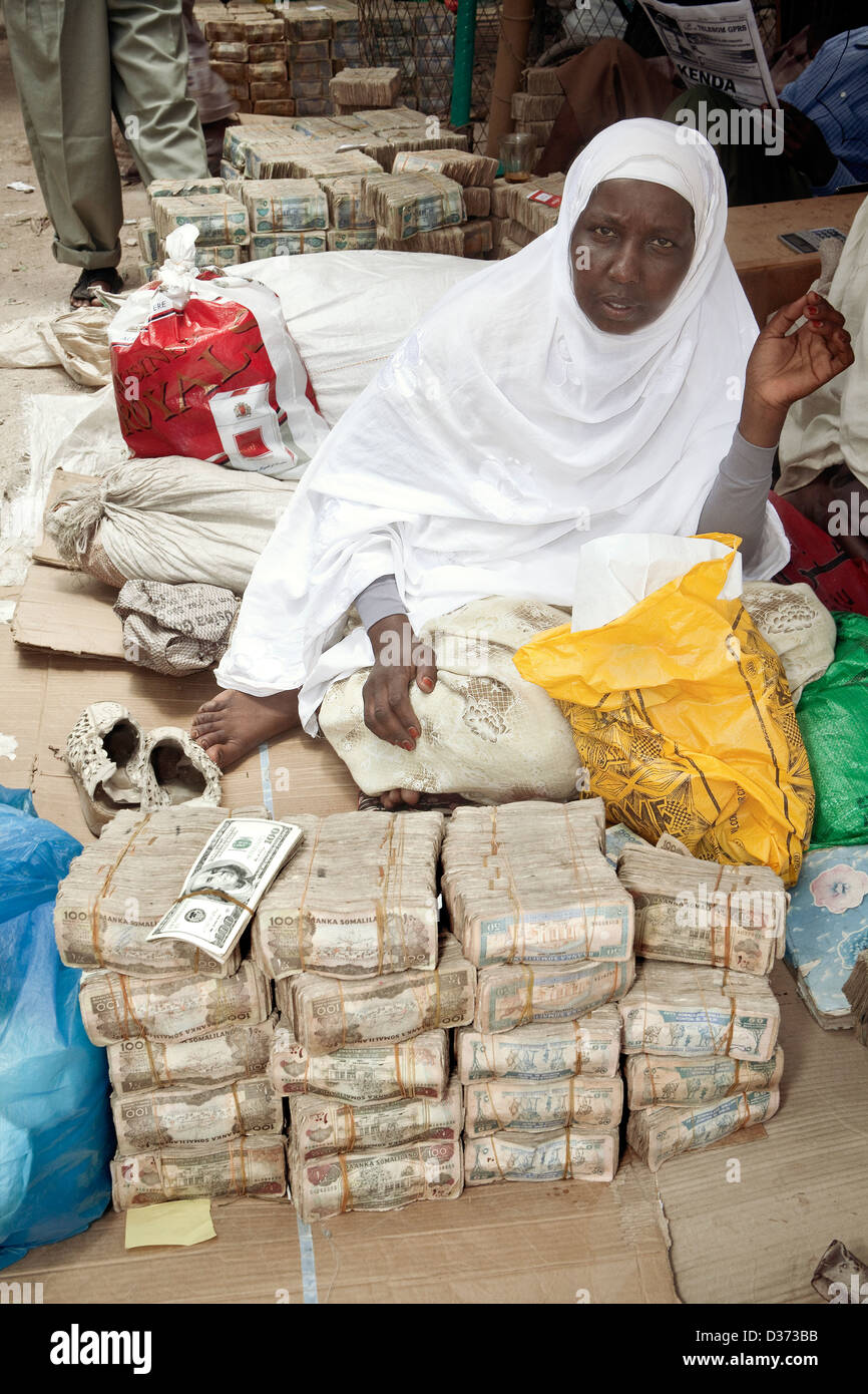 A female trader at the money exchange market in Hergeisa Stock Photo ...