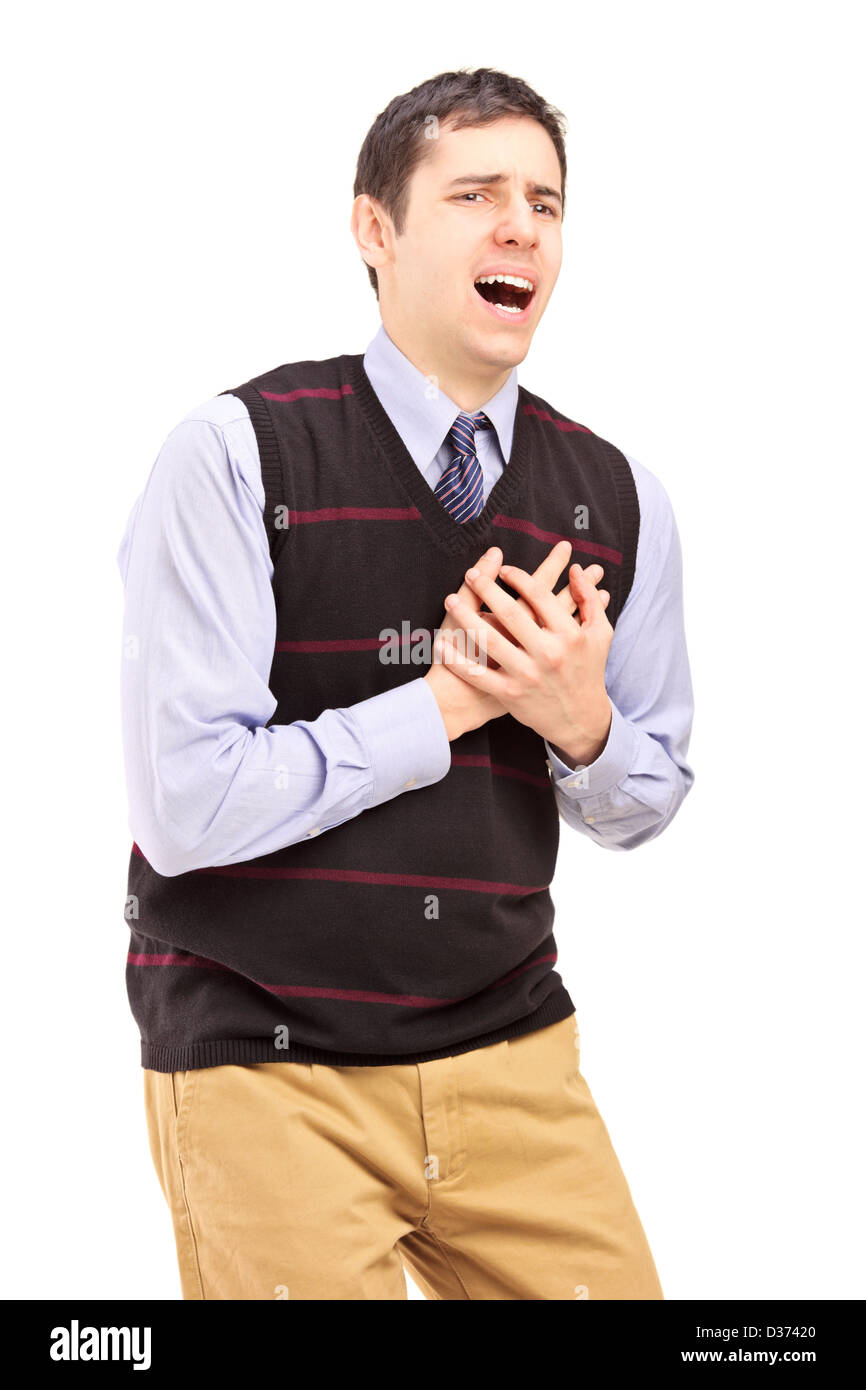 A young man having a heart attack isolated on white background Stock ...