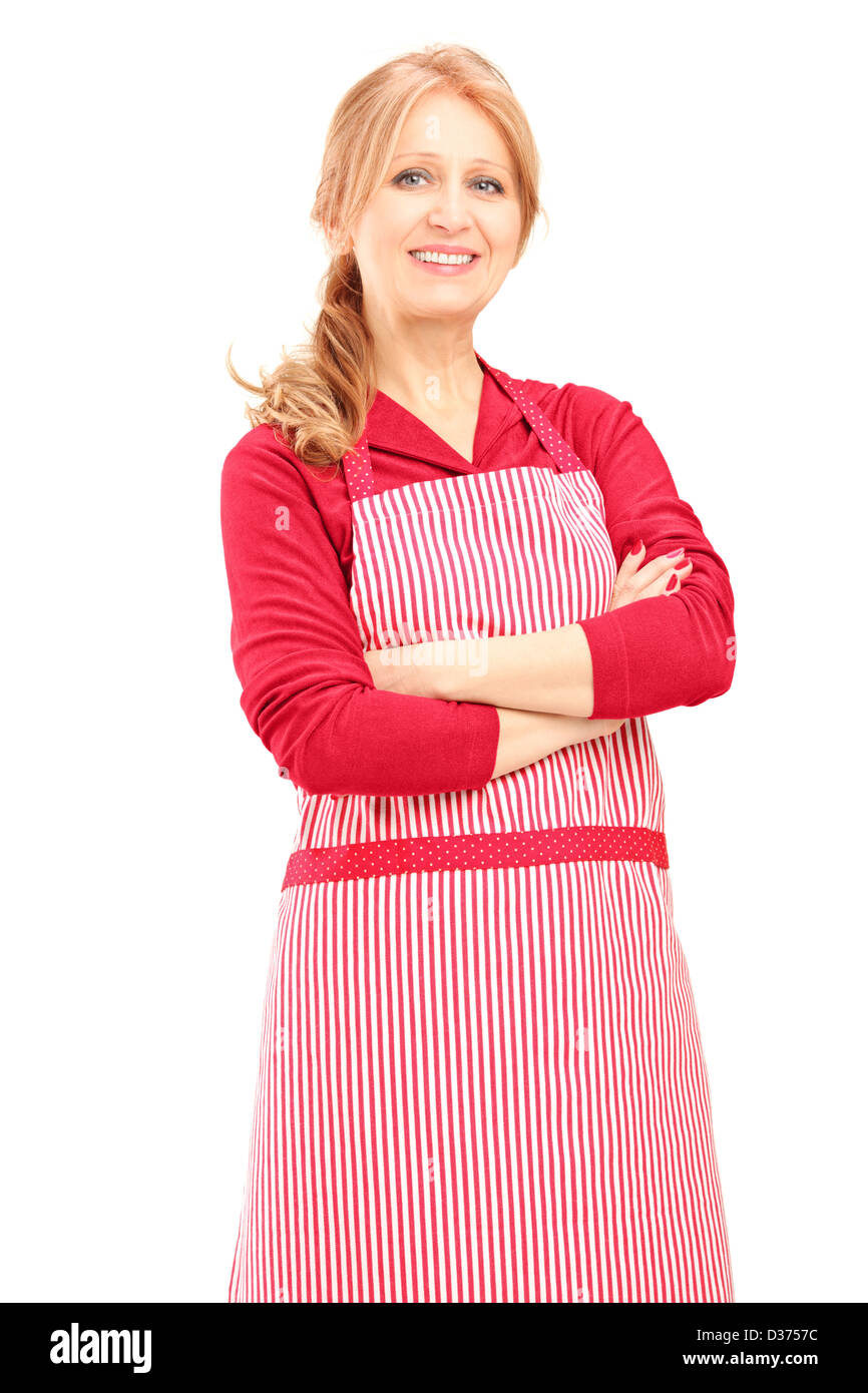 Smiling female worker wearing an apron and posing isolated on white ...