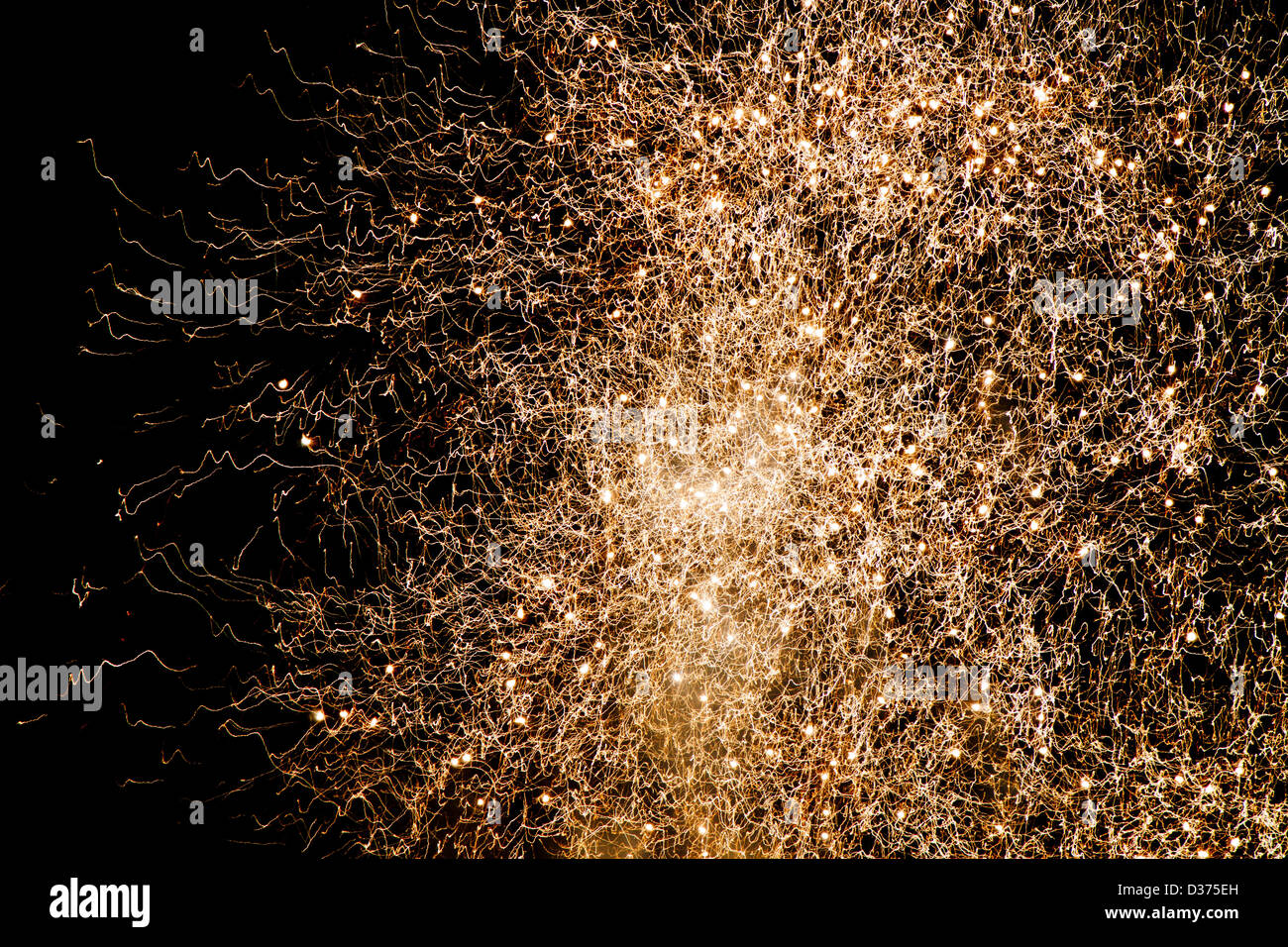Sparks from a firework Stock Photo - Alamy