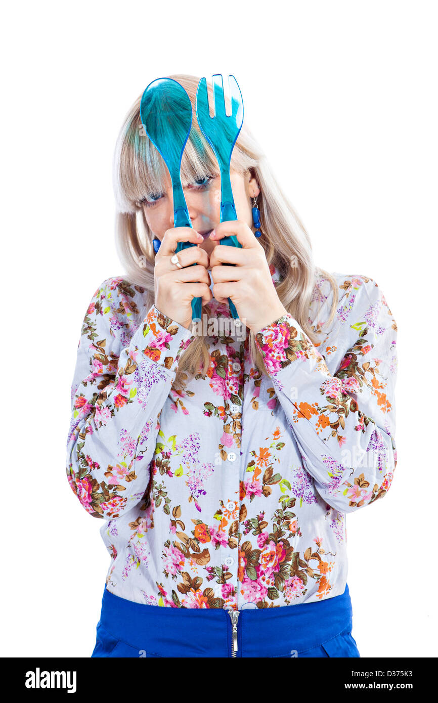 Beautiful blond holding spoon and fork isolated on white background ...