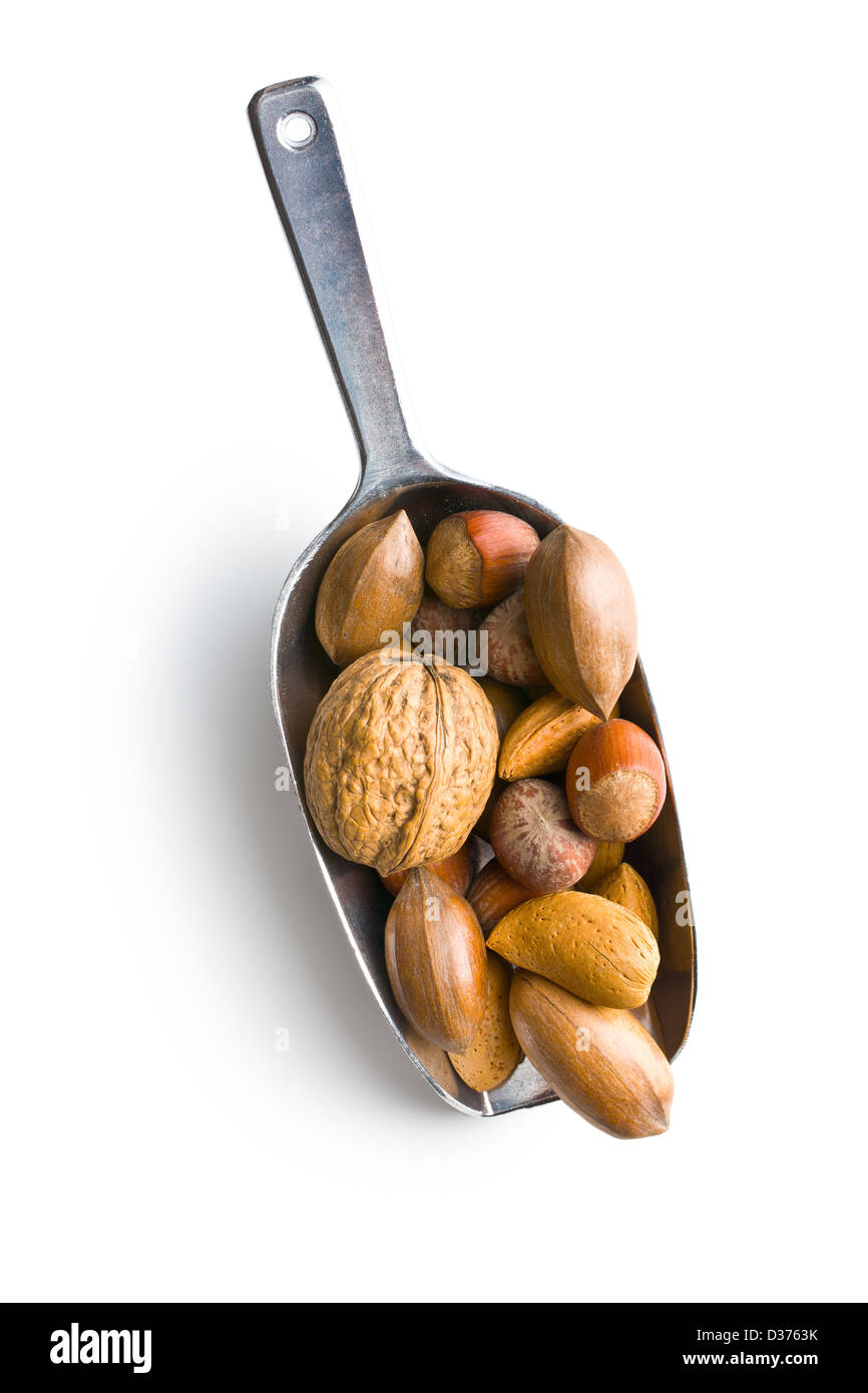 various nuts in scoop on white background Stock Photo - Alamy