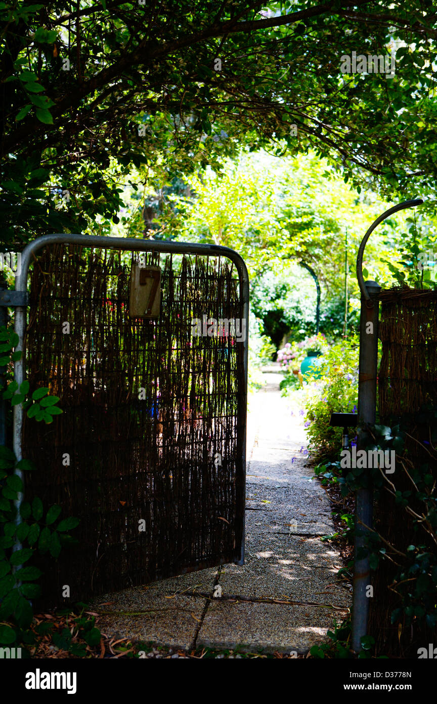 Overgrown garden gate hi-res stock photography and images - Alamy