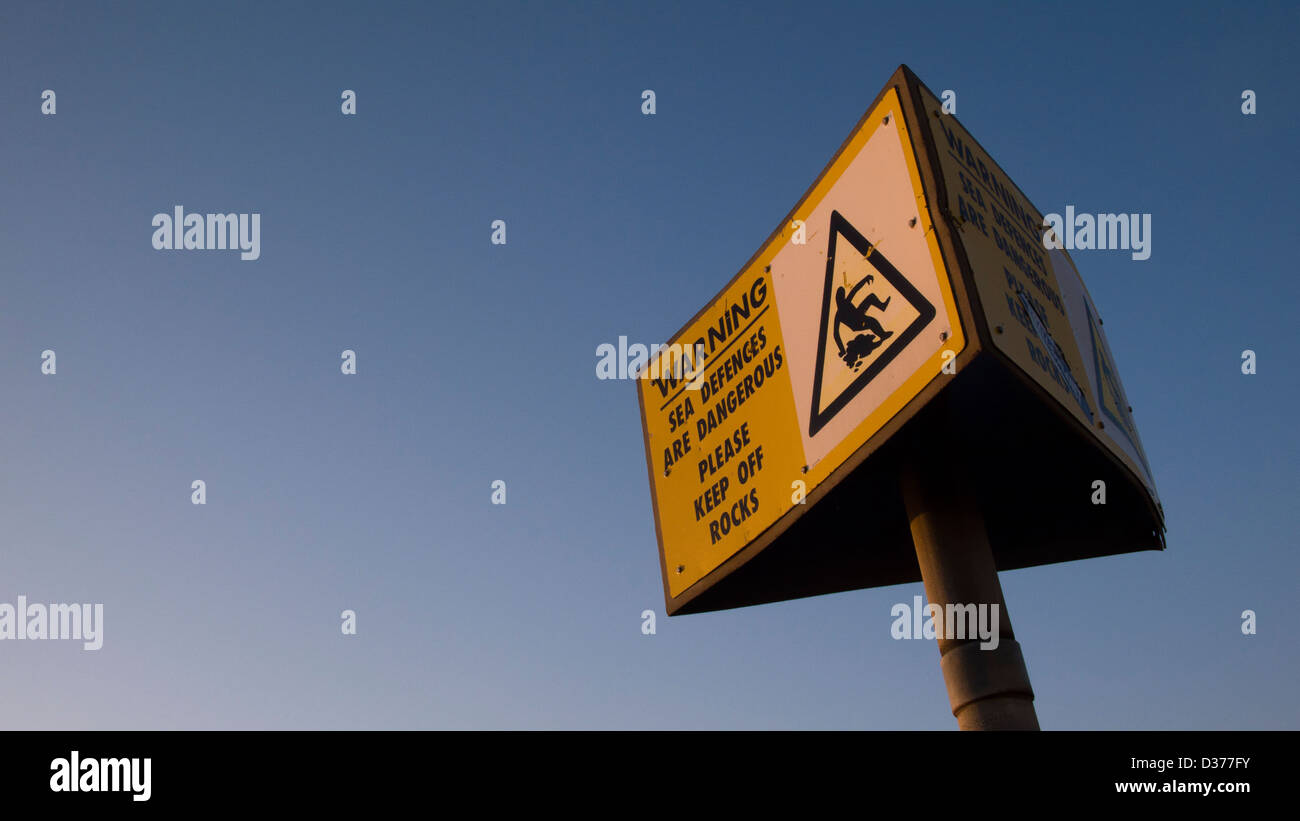 Yellow warning sign at sea hi-res stock photography and images - Alamy