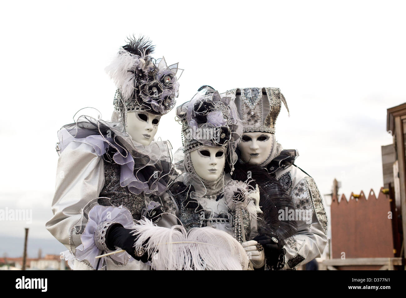 A Party of Three celebrating the Carnival of Venice Stock Photo - Alamy