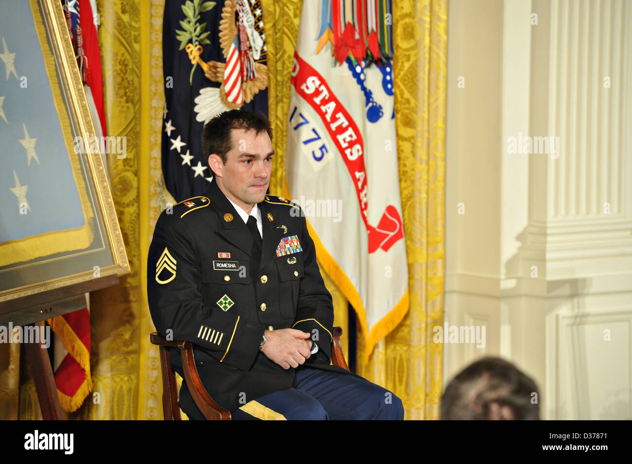 US Army Staff Sergeant Clinton Romesha sits during the Medal of Honor ...