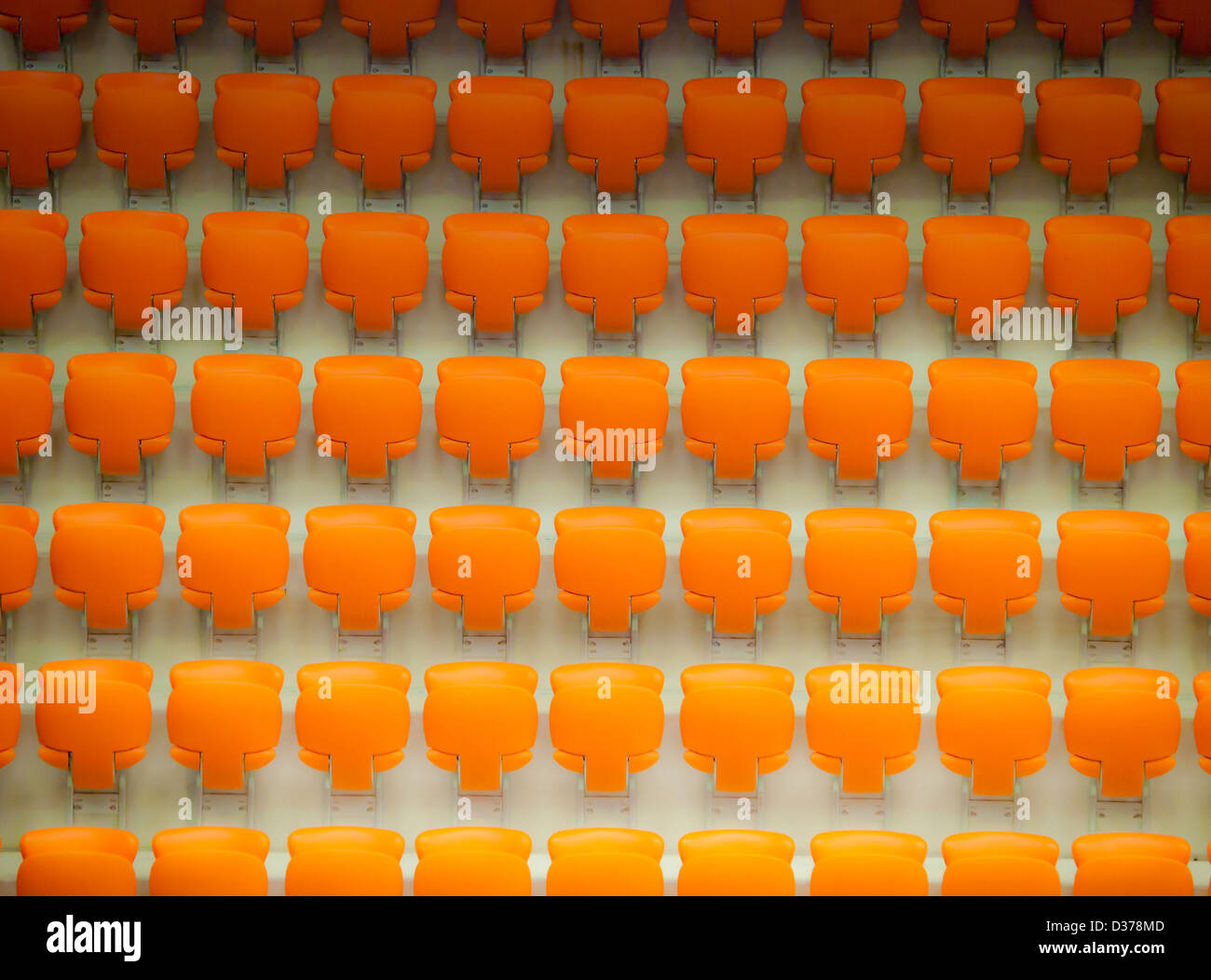 empty stand with orange chairs Stock Photo - Alamy