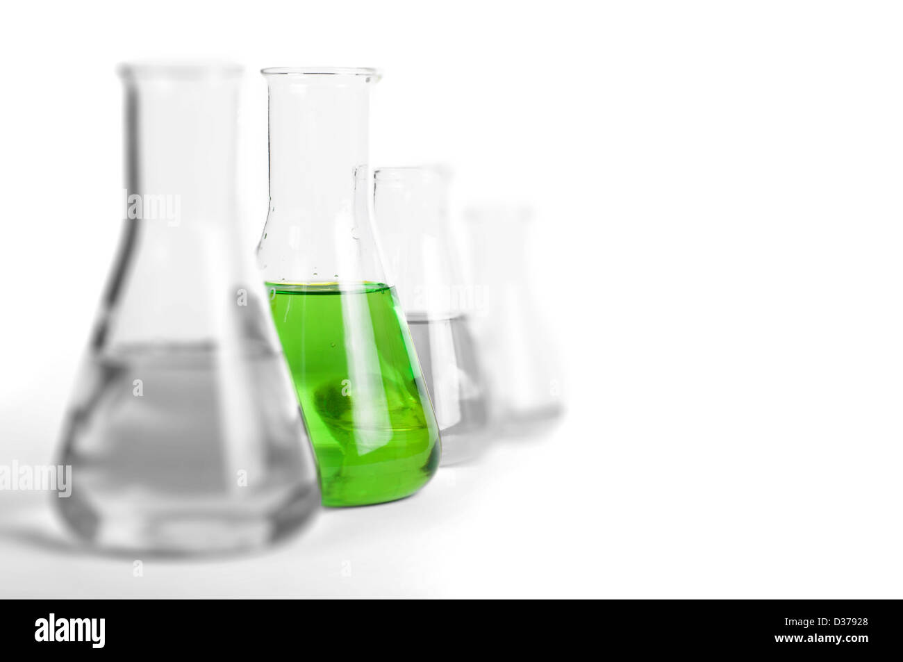 Laboratory glassware equipment. Laboratory beakers filled with colored ...