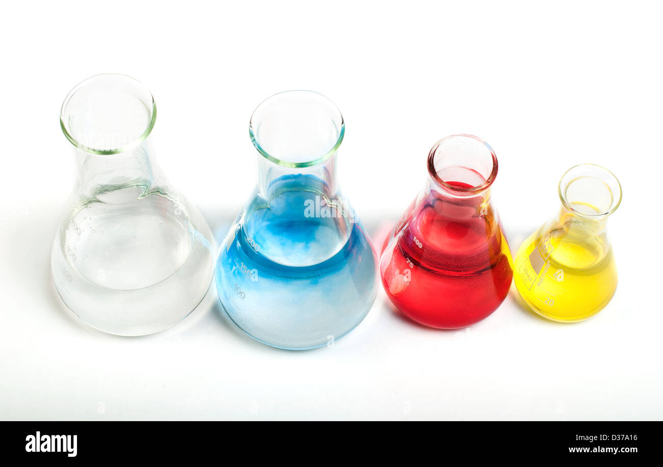 Laboratory equipment and color chemicals on white background Stock ...