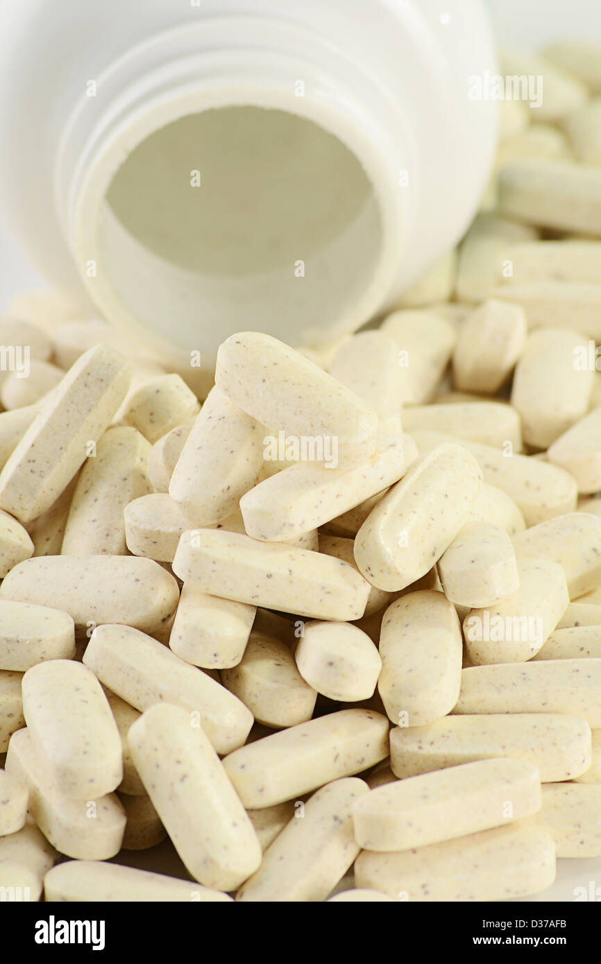 Composition with dietary supplement pills and containers Stock Photo ...