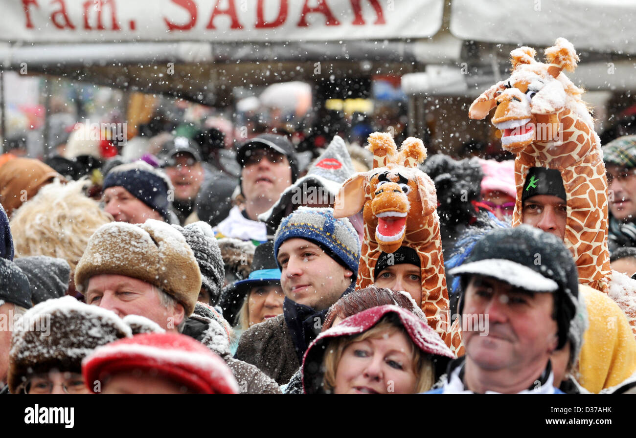 Spectators watch the traditional dance of the market women on Shrove ...