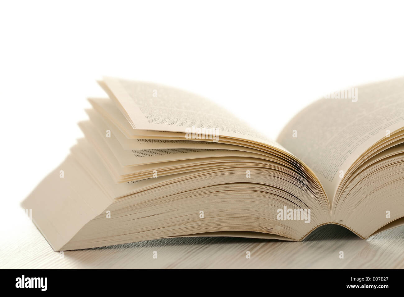 Book on the table over white background Stock Photo - Alamy