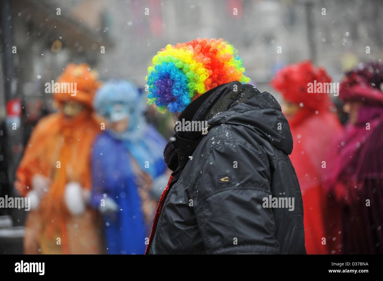 Carnival revelers walk through the inner city on Shrove Tuesday in ...
