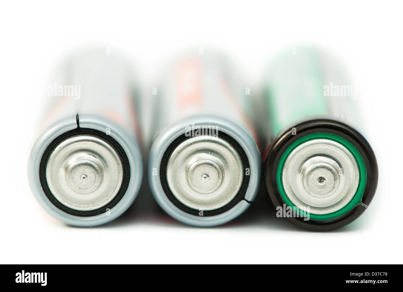 Three batteries close up. White isolated studio shot Stock Photo - Alamy