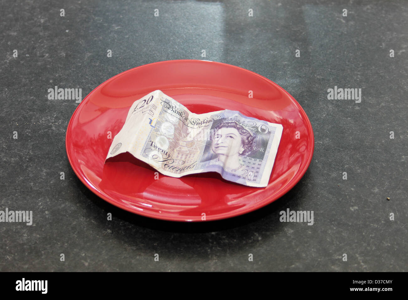 money on a plate Stock Photo - Alamy