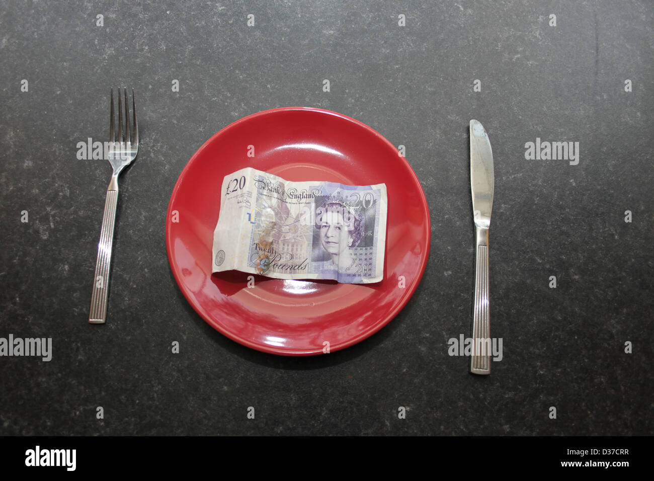 Dinner plate with money hi-res stock photography and images - Alamy
