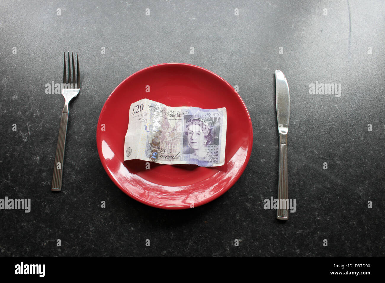 money on a plate Stock Photo - Alamy