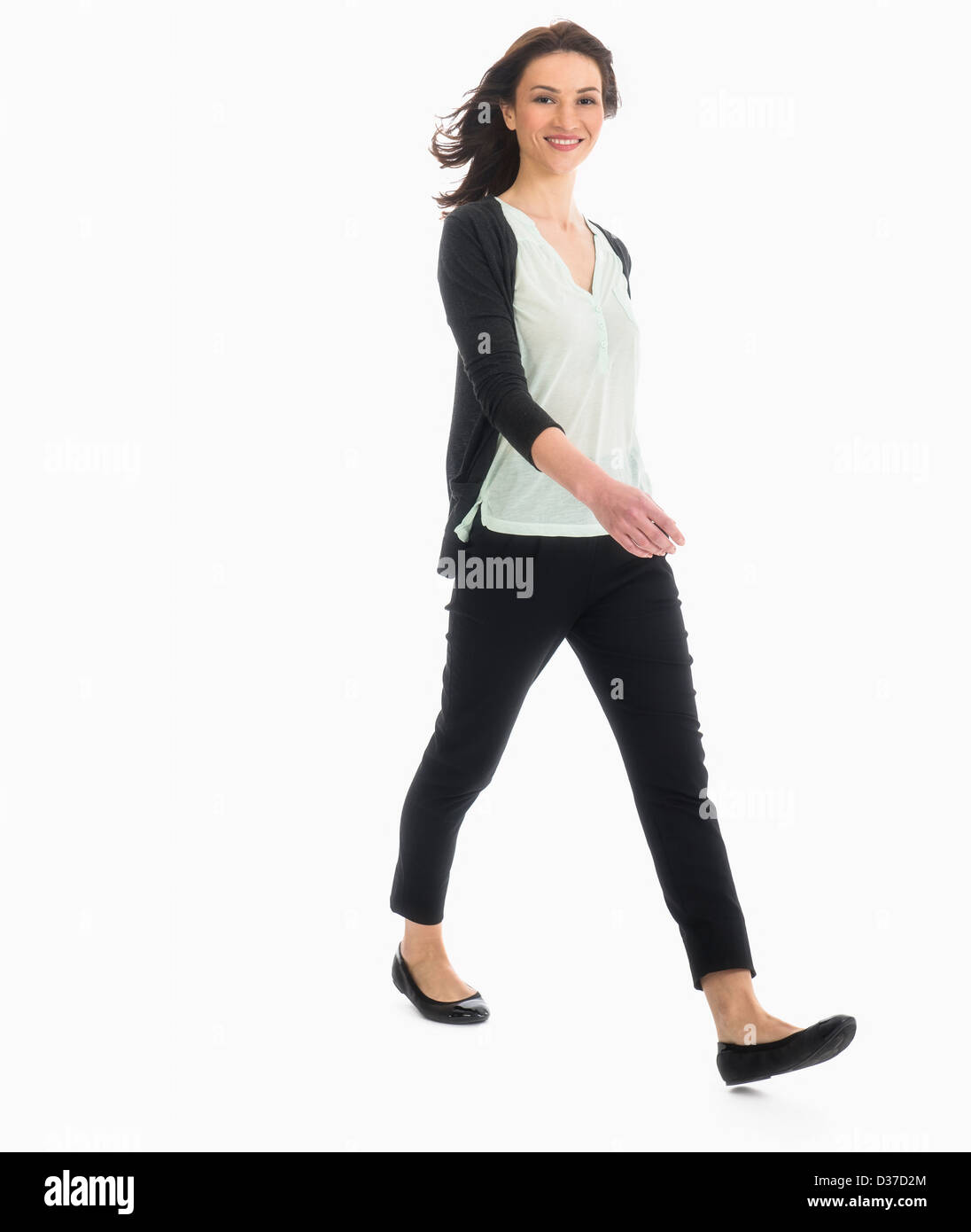 Walking mid adult female Cut Out Stock Images & Pictures - Alamy