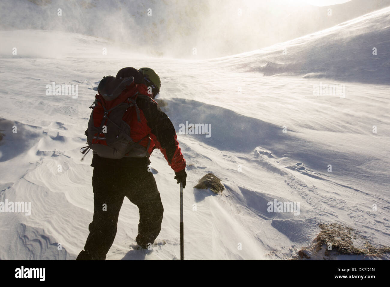 A climber battles blizzards and drifting snow in Coire an Sneachda in ...