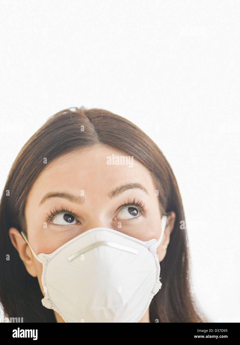 Studio portrait of woman wearing flu mask Stock Photo - Alamy