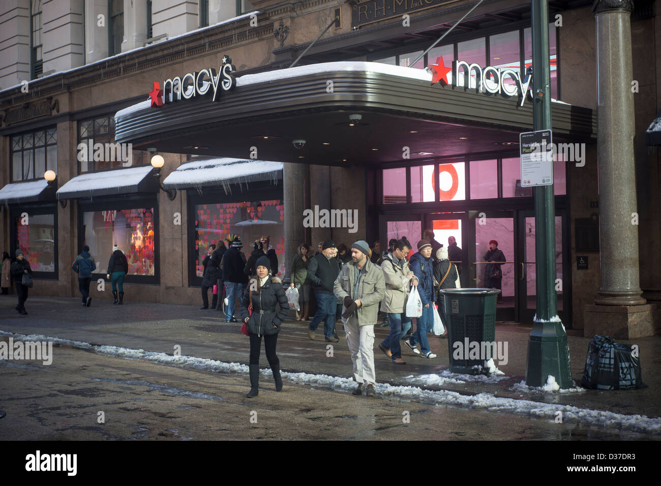 Shoppers outside the newly renovated Herald Square entrance to Macy's ...