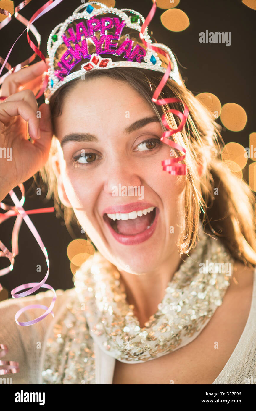 Woman celebrating New Year's Eve Stock Photo - Alamy