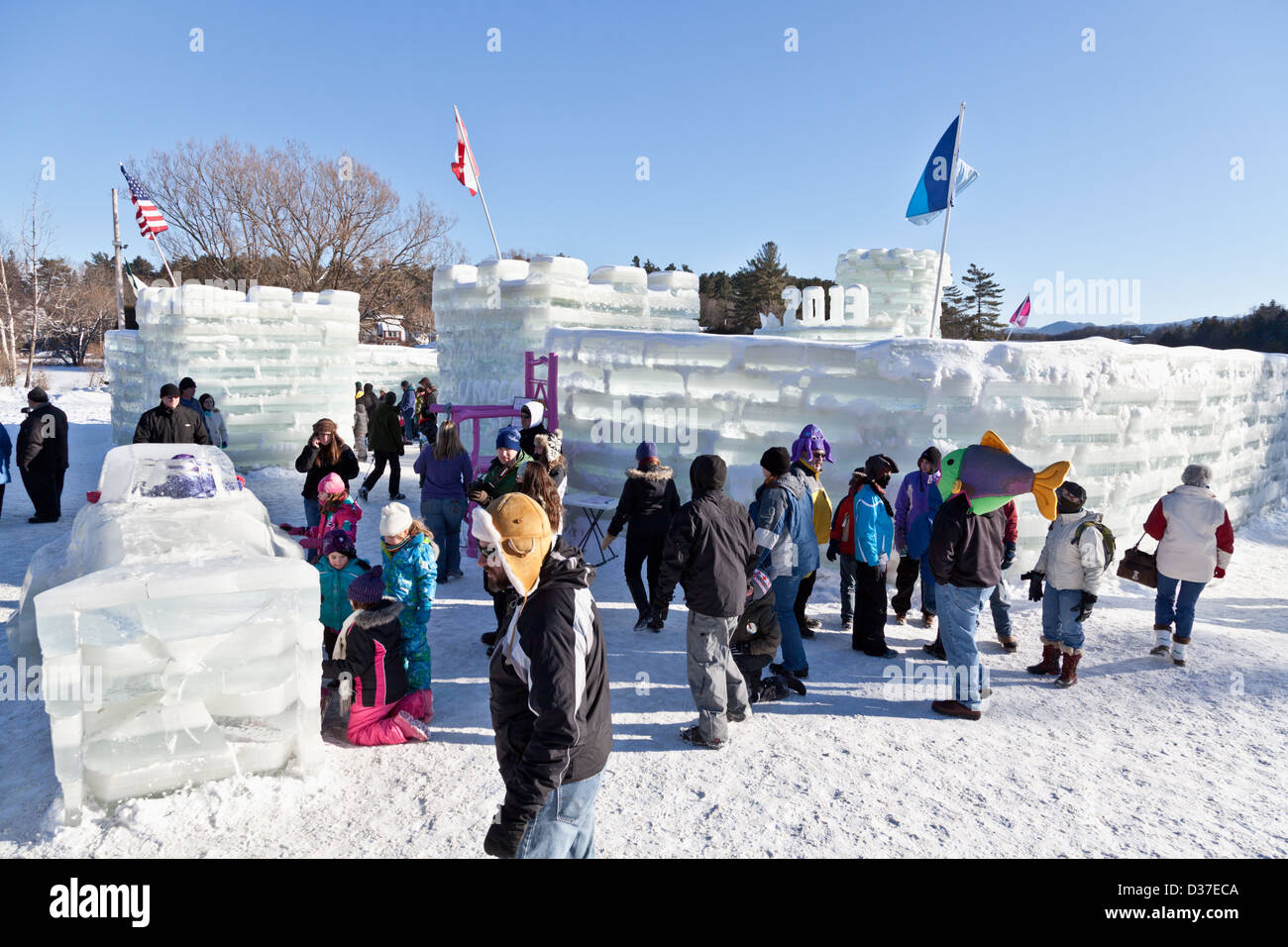 Children and families explore the ice palace at Saranac Lake Winter ...