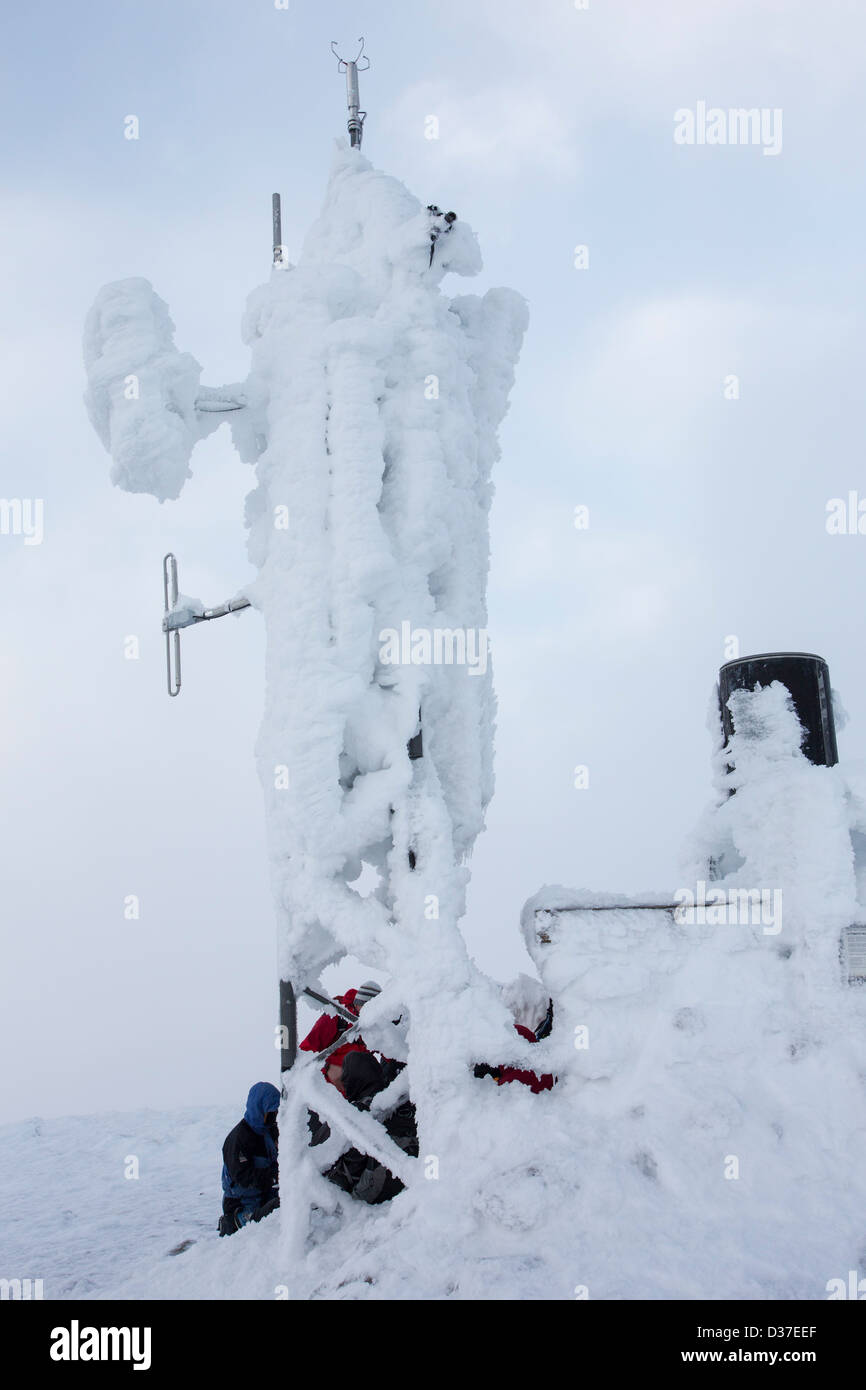 Rime ice coating the automatic weather station on the summit of the ...