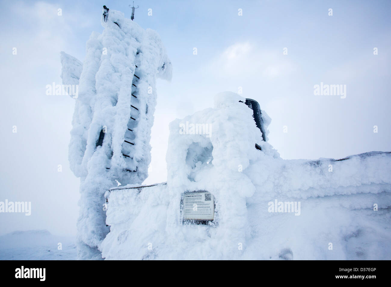Rime ice coating the automatic weather station on the summit of the ...