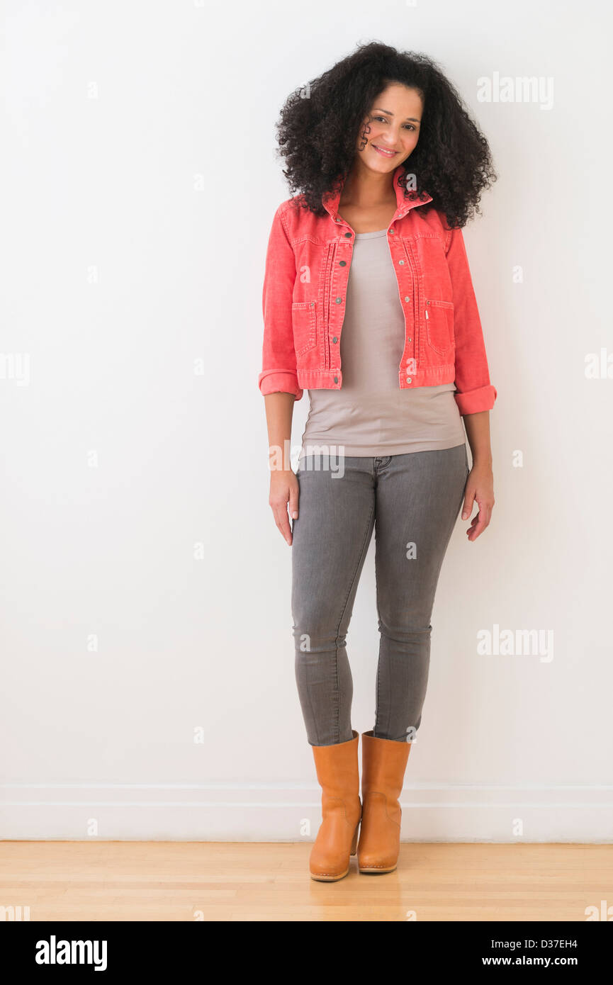 USA, New Jersey, Jersey City, Portrait of smiling mid adult woman ...