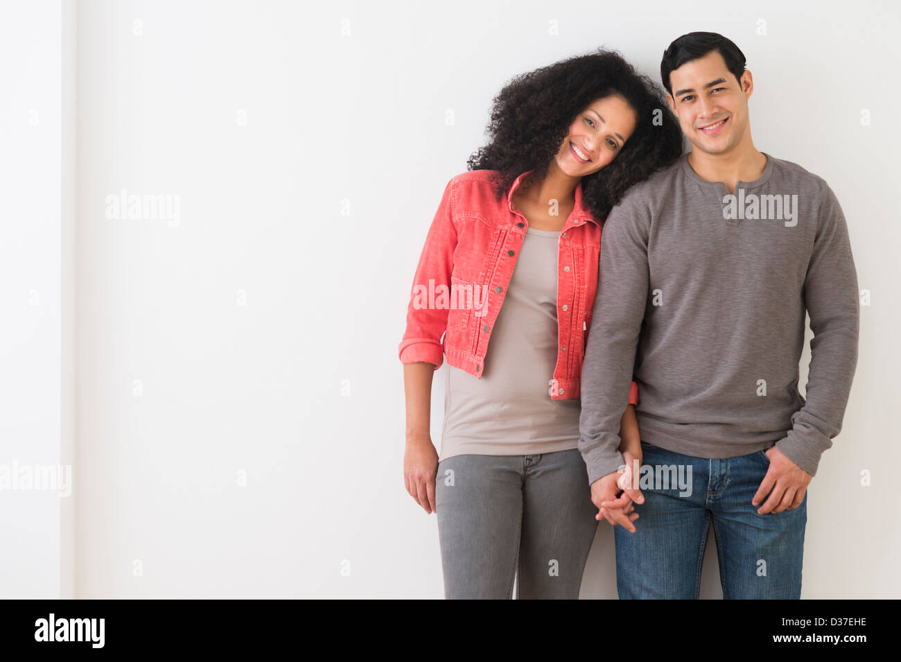 USA, New Jersey, Jersey City, Portrait of smiling couple standing ...