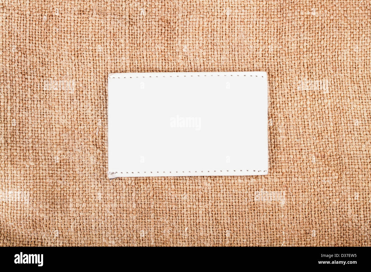 Background texture vintage burlap with label Stock Photo - Alamy