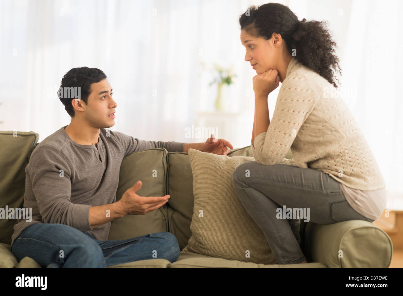 Two people talking sofa hi-res stock photography and images - Alamy